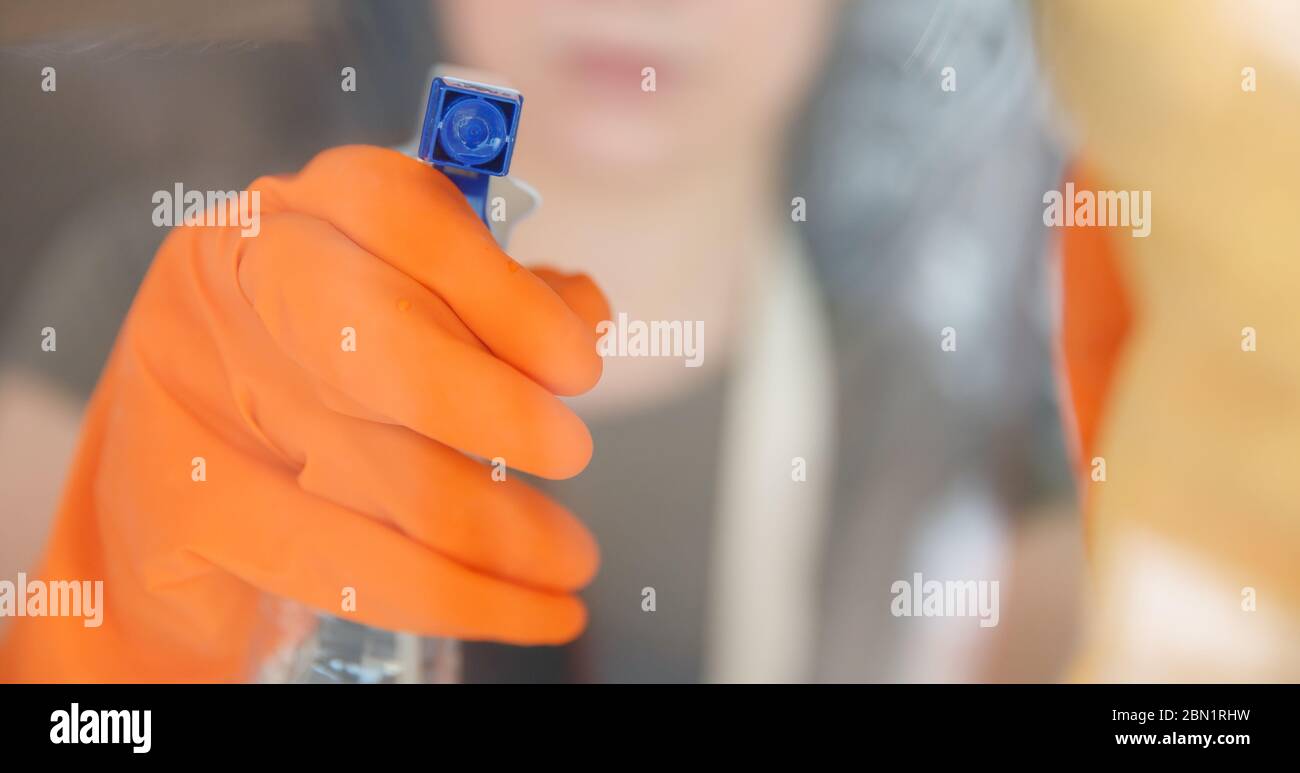 Window washing glass with cleaning agent and rag Stock Photo - Alamy