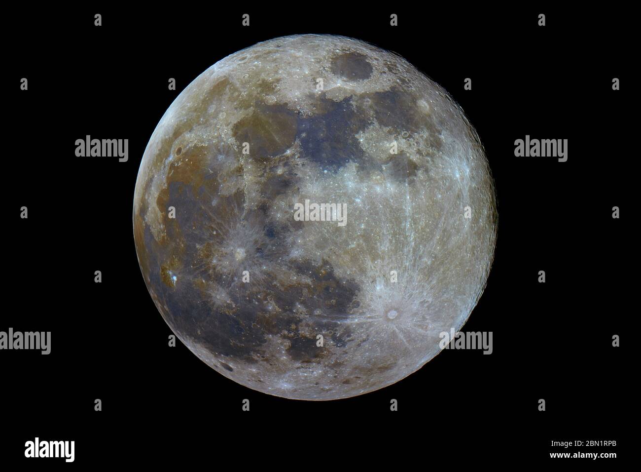 Full mineral Moon phase, isolated in the black space, with its natural ...