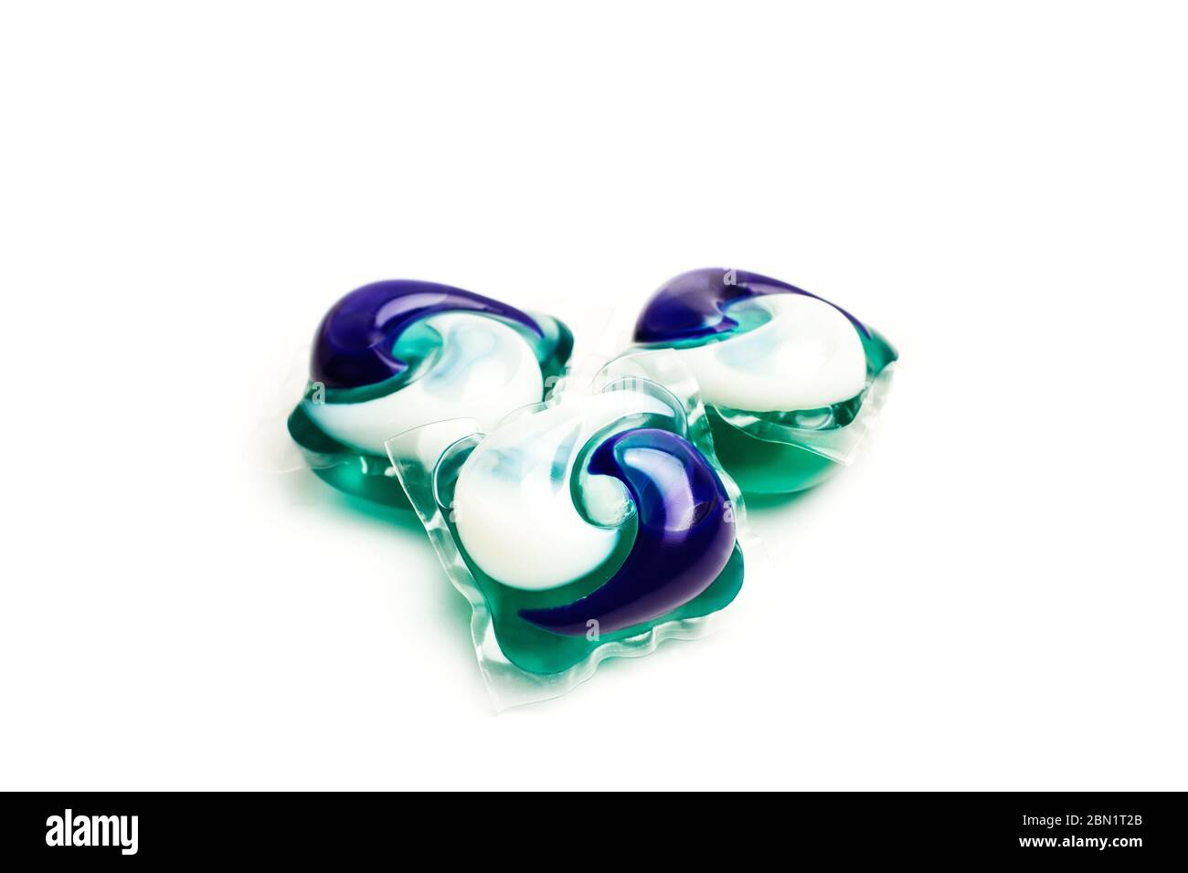 Washing machine detergent pod on a white background in a close up view ...