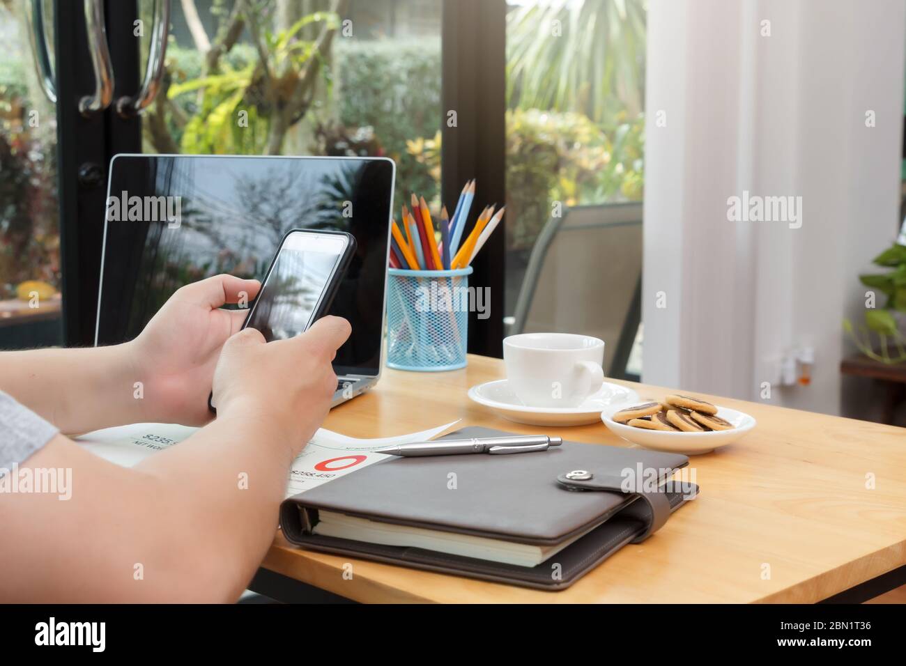 Work from home,Businessman working remotely from home. Using computer ...
