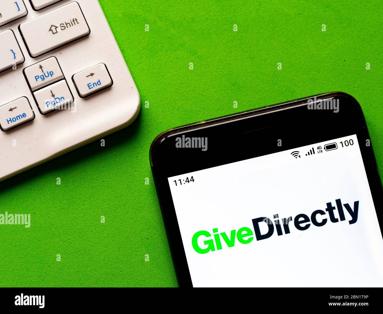 In this photo illustration Givedirectly logo is seen displayed on a ...