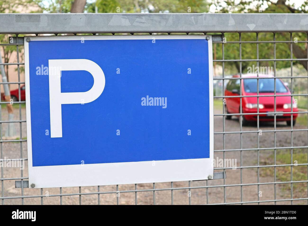 Closed parking lot and sign Stock Photo - Alamy