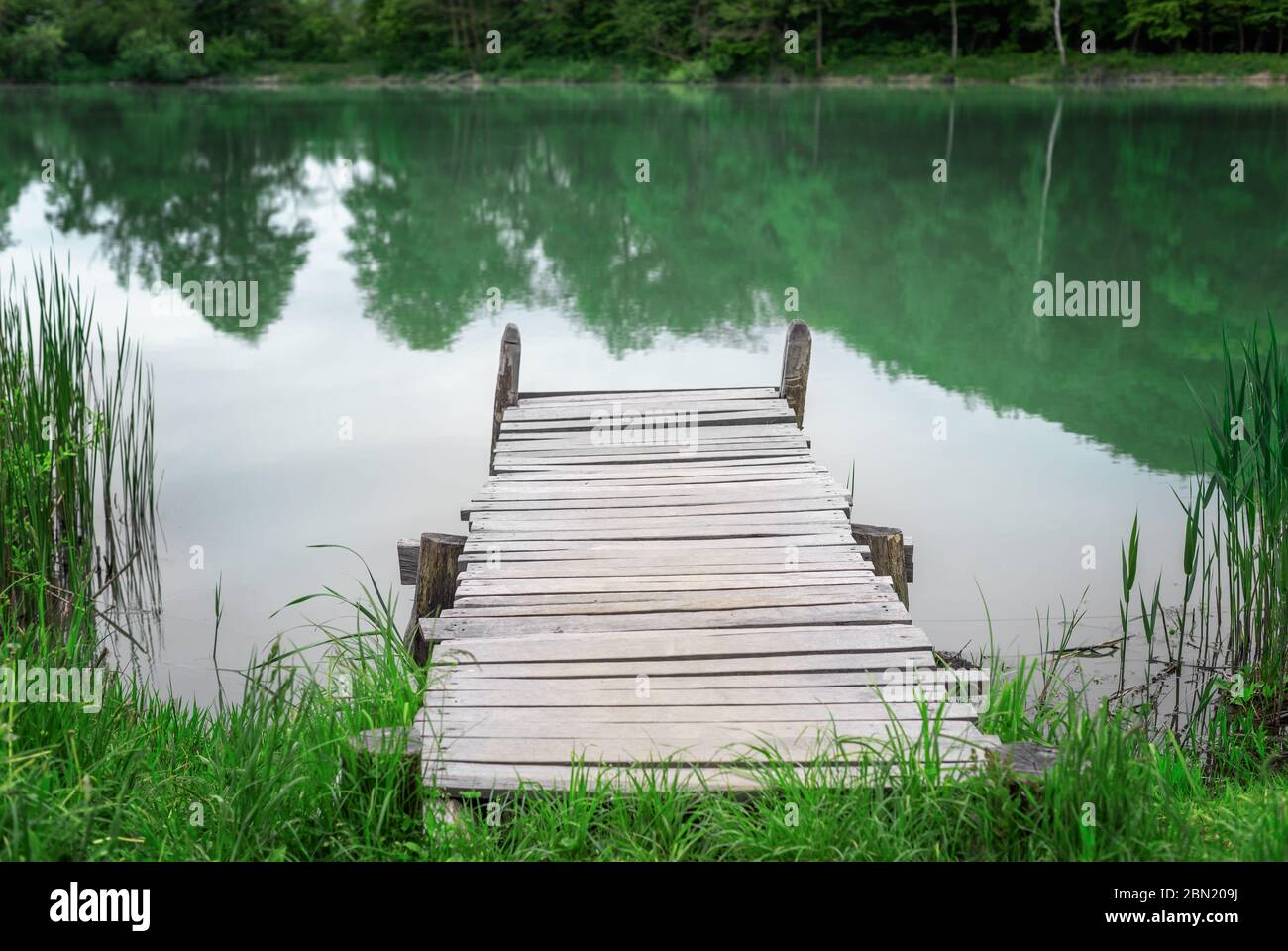 Wooden platform on shore pond hi-res stock photography and images - Alamy