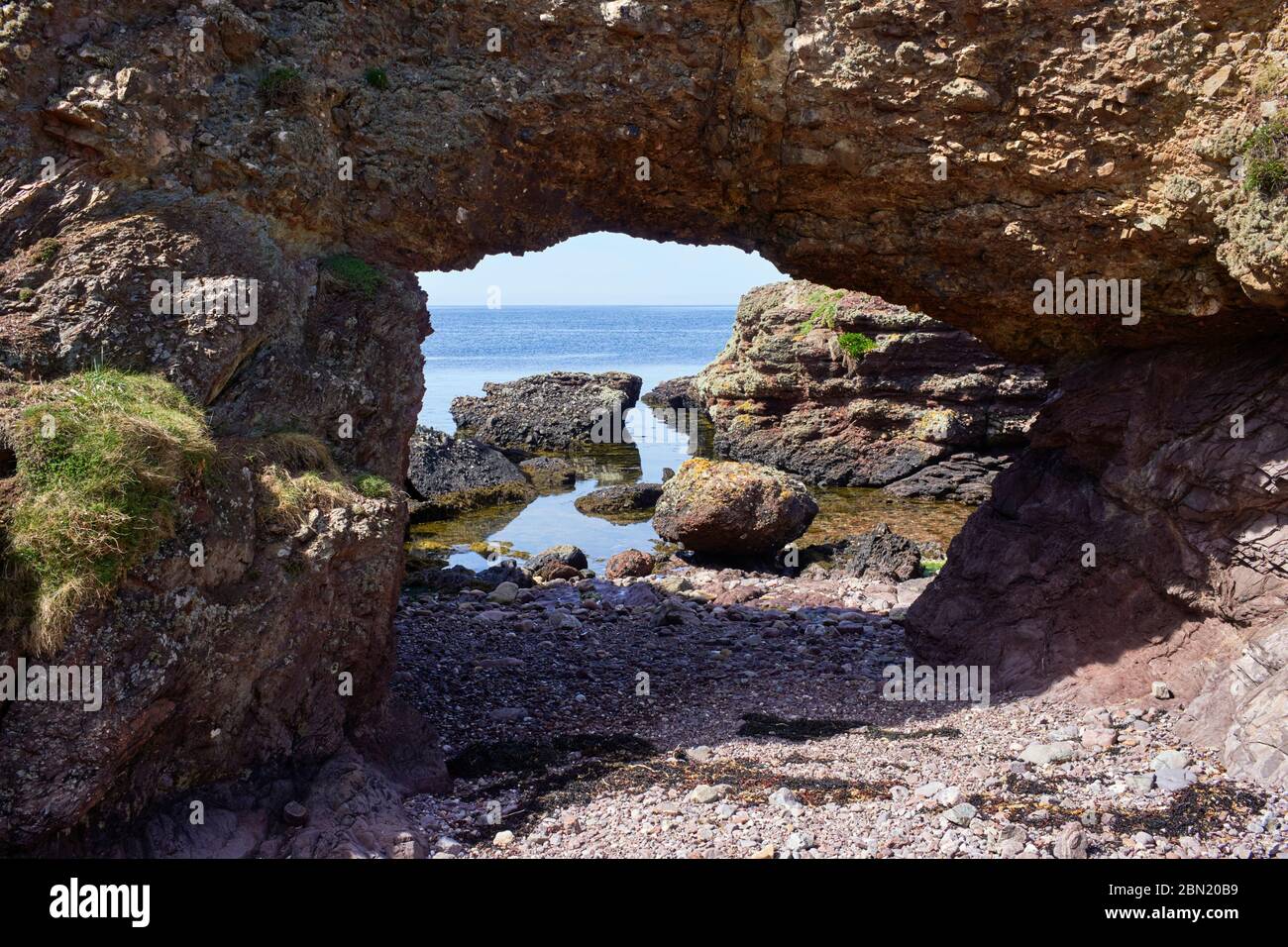 View across Castletown Bay viewed from Langness peninsular with archway ...