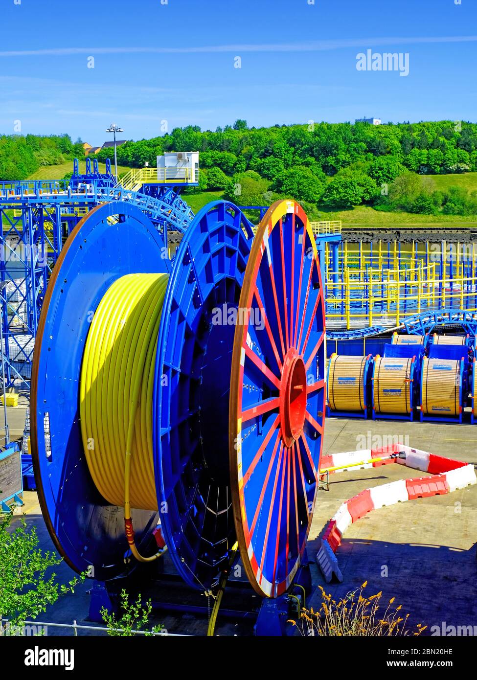 Massive underwater comms cable winding machinery and half full reel ...