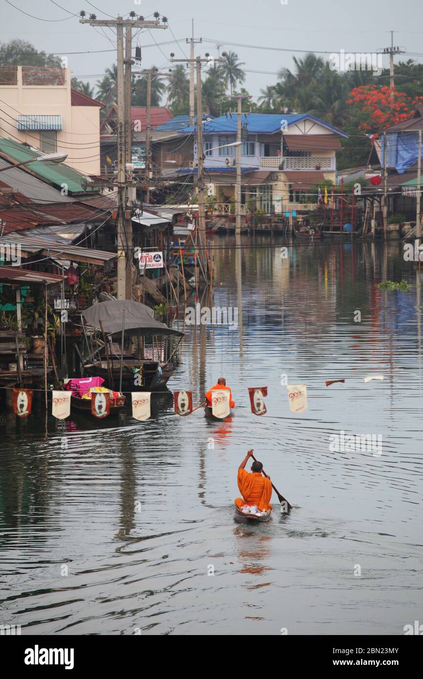 Buddhist monk on boat in hi-res stock photography and images - Alamy