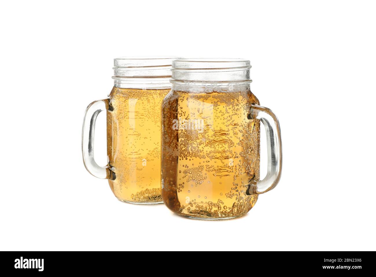 Glass jars with cider isolated on white background Stock Photo - Alamy