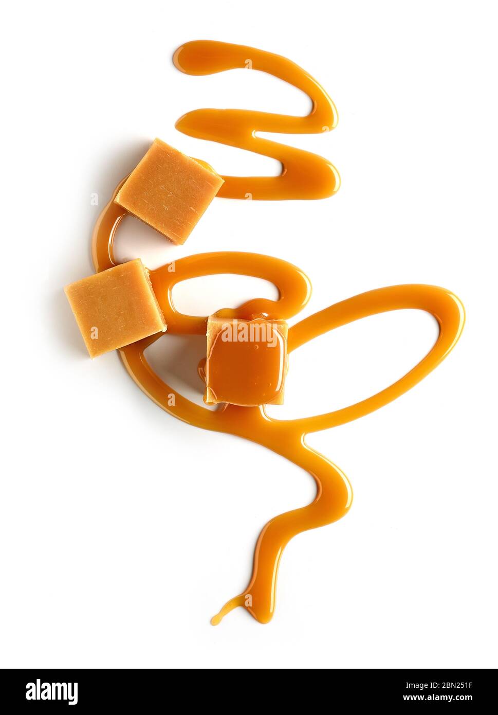 composition of caramel candies isolated on white background, top view ...