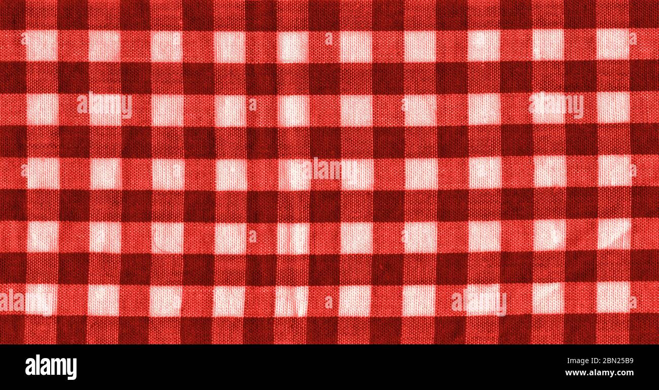 The texture of the bright red of binding gingham fabric. Red textile ...