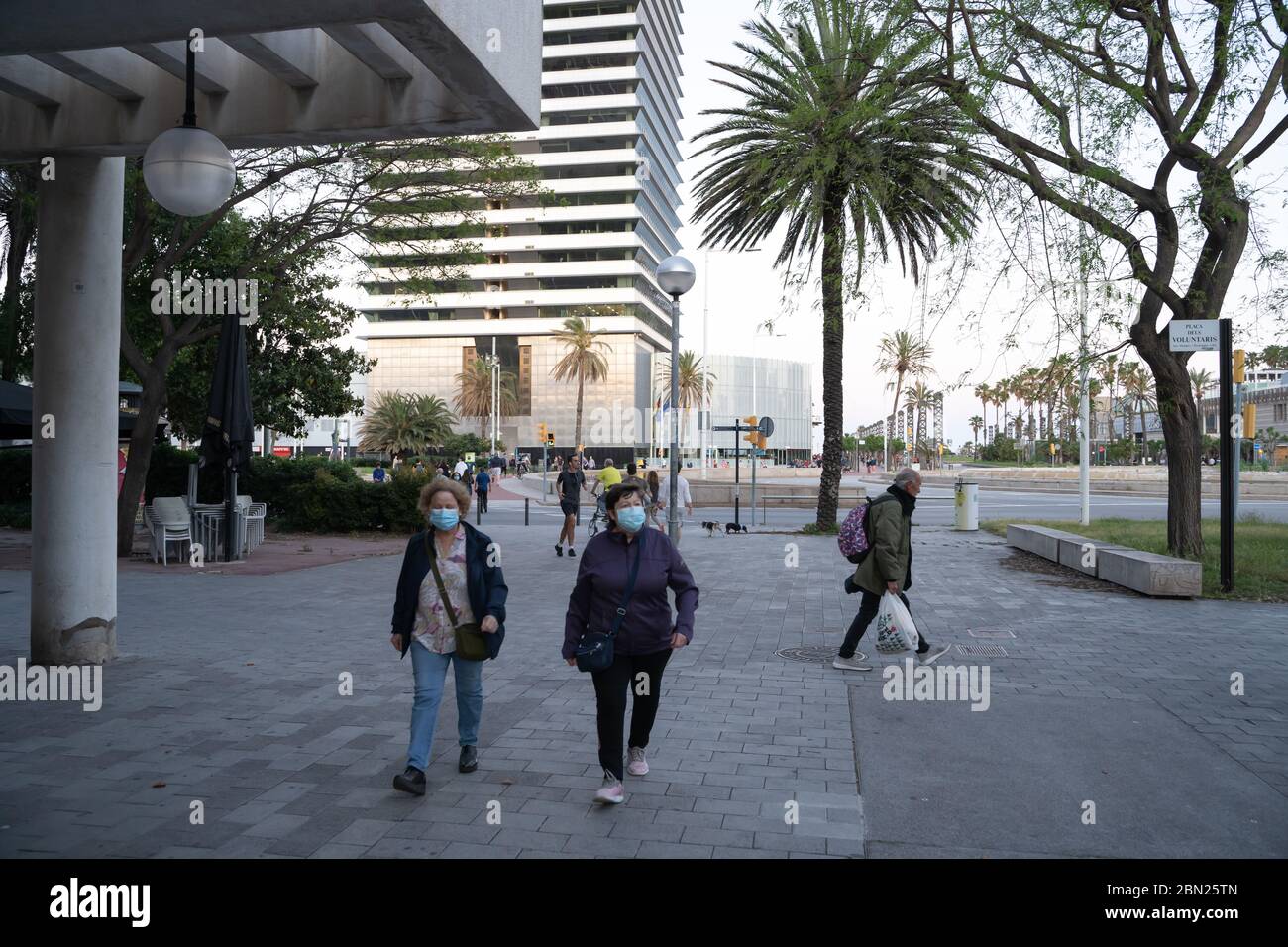 people walking and running in the streets during the coronavirus ...