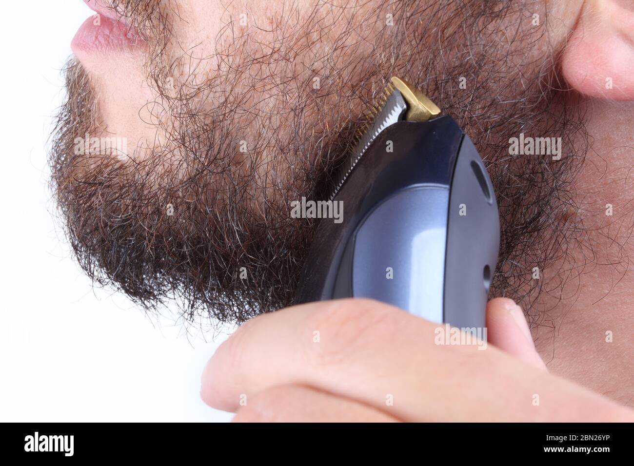 boy cutting shave with electric razor Stock Photo - Alamy