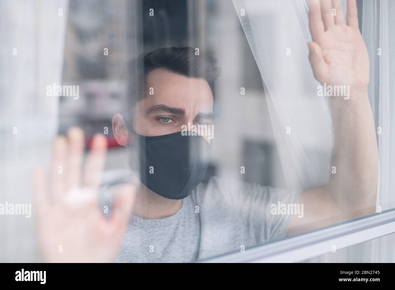 Hands on window hi-res stock photography and images - Alamy
