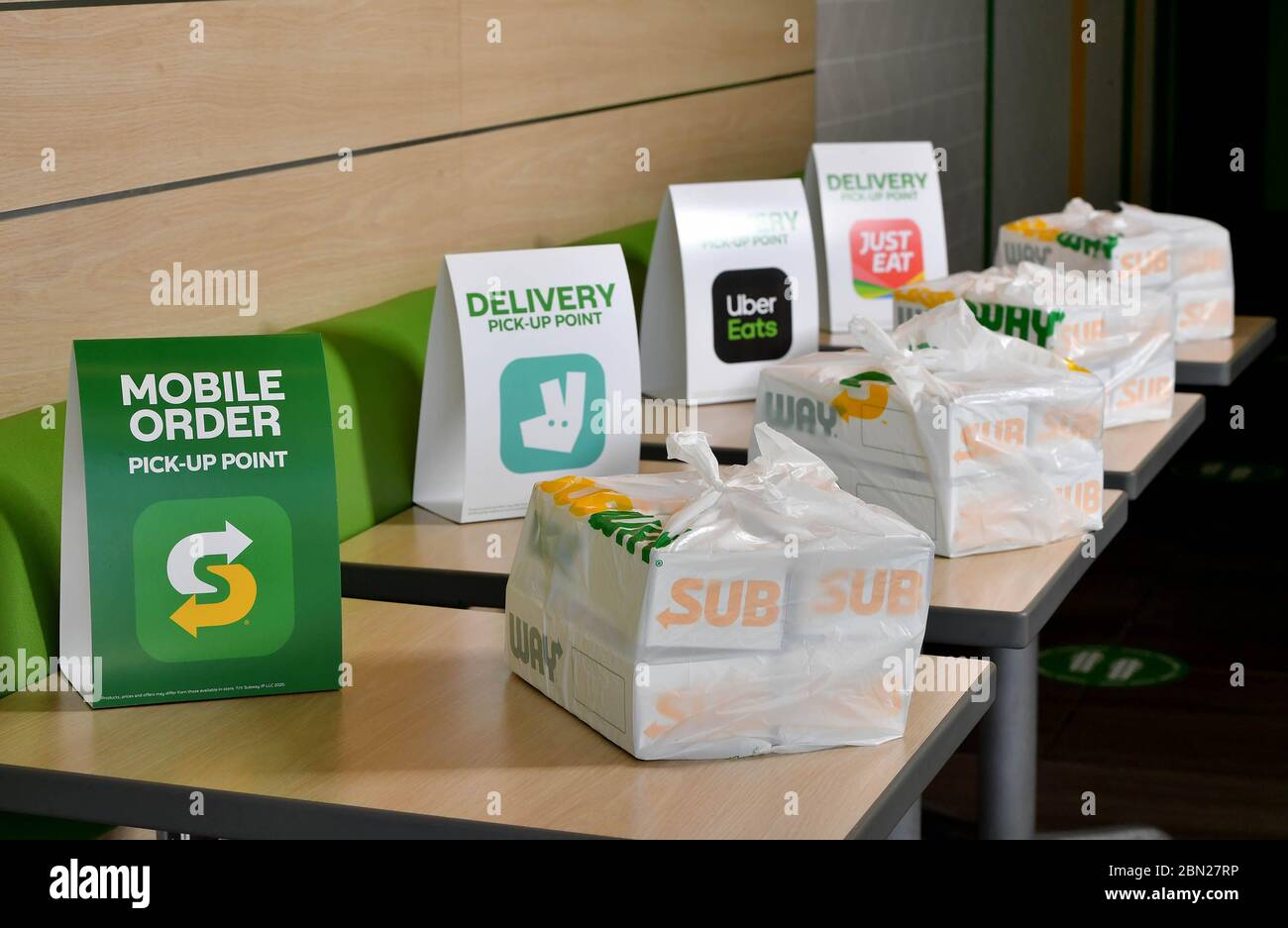 A Subway store in Wakefield, which features signage and protective ...
