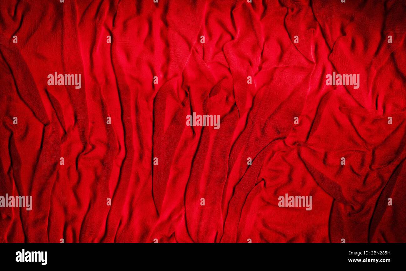Bright red texture of binding crumpled fabric. Red textile background ...