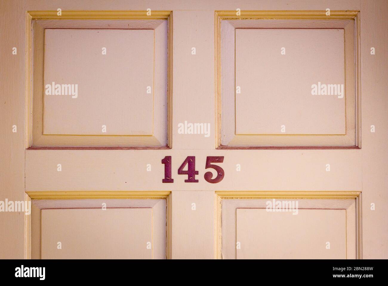 House number 145 on a traditional British wooden front door Stock Photo ...