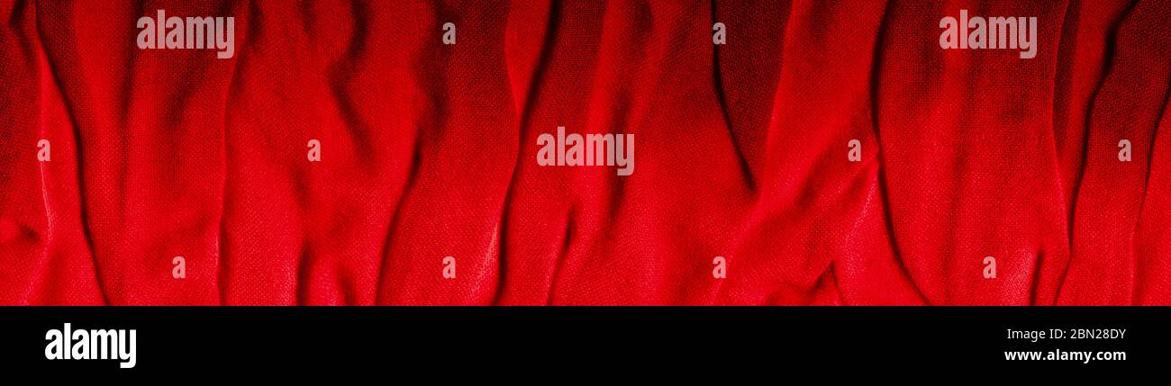 Bright red texture of binding crumpled fabric. Red textile background ...