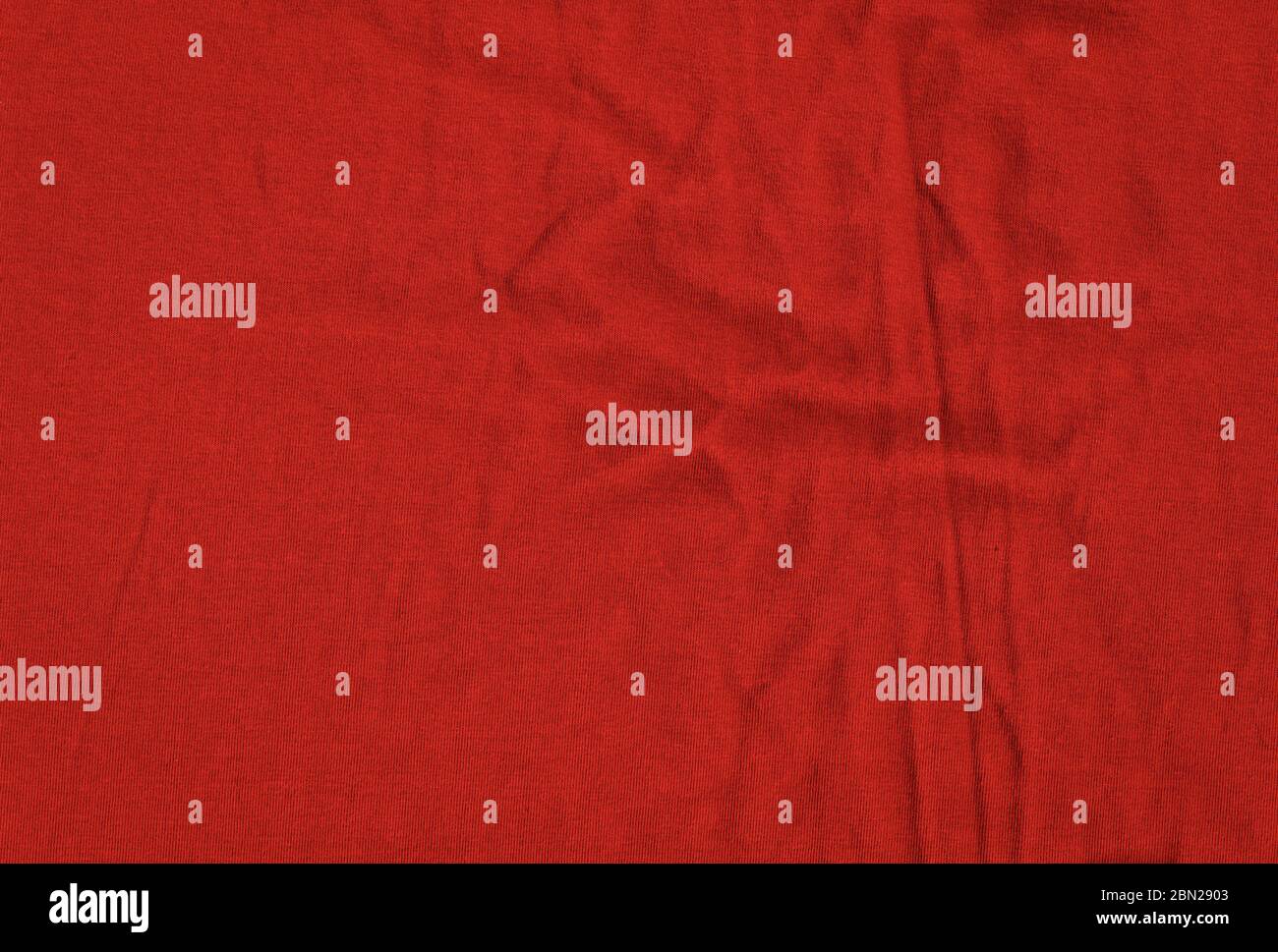 Bright red texture of knit fabric. Red textile background with natural ...