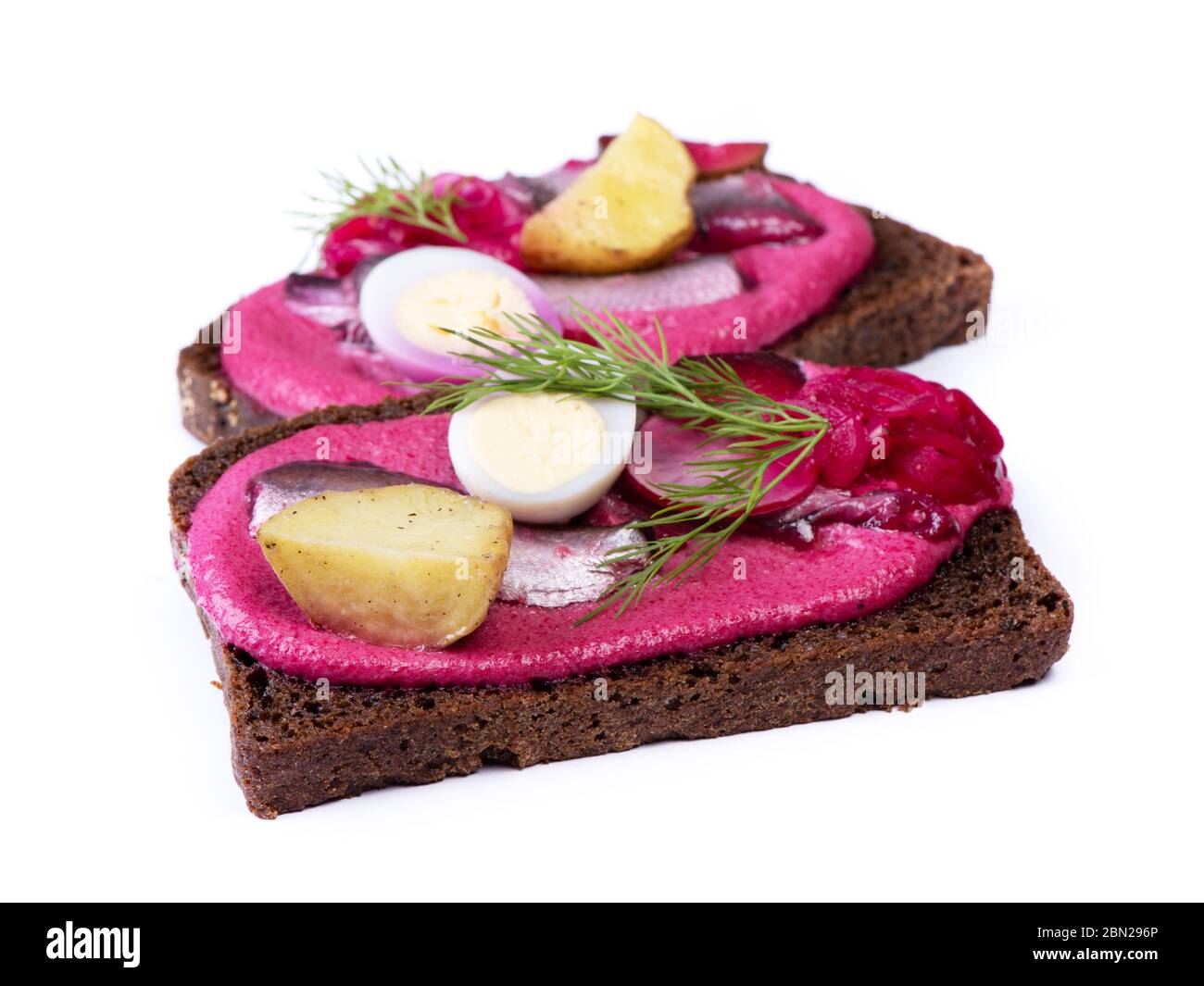 Sandwich with fish and egg, bread canape with anchovy isolated on white ...