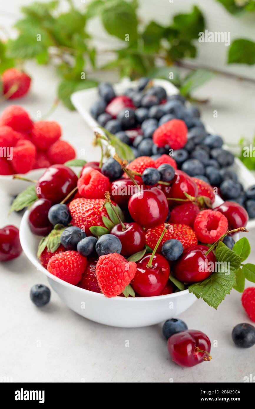 Berries closeup assorted mix of strawberry, blueberry, raspberry and ...