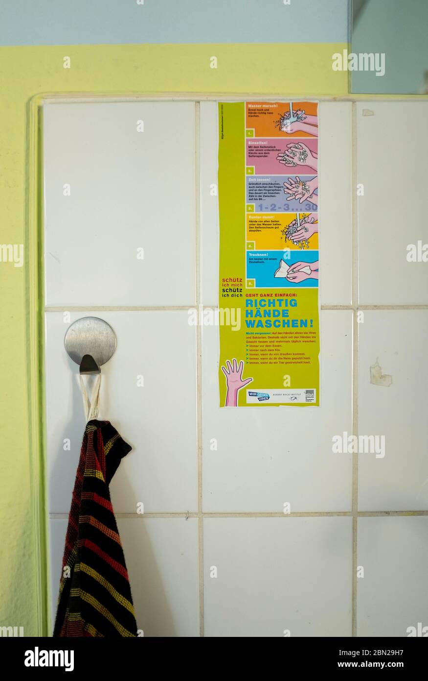 "Wash your hands properly" rules on a sink in a classroom at a primary ...
