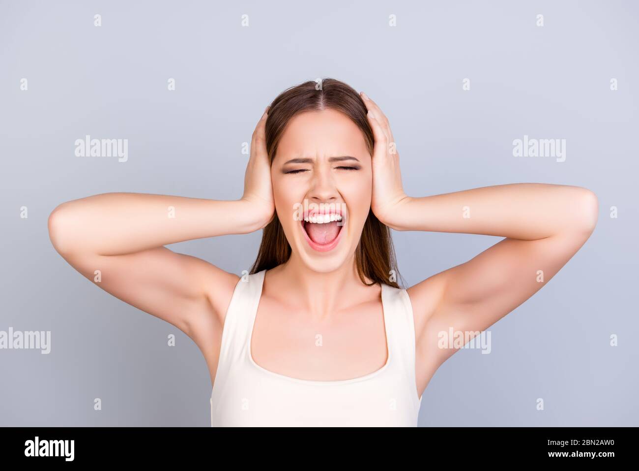 Stop it! Silence! Quiet! Close up of a stressed yelling teen with ...