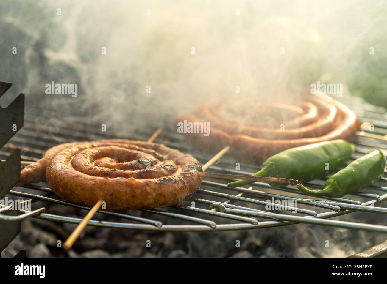 Sausages and traditional romanian sausages called ”mici” or ”mititei ...