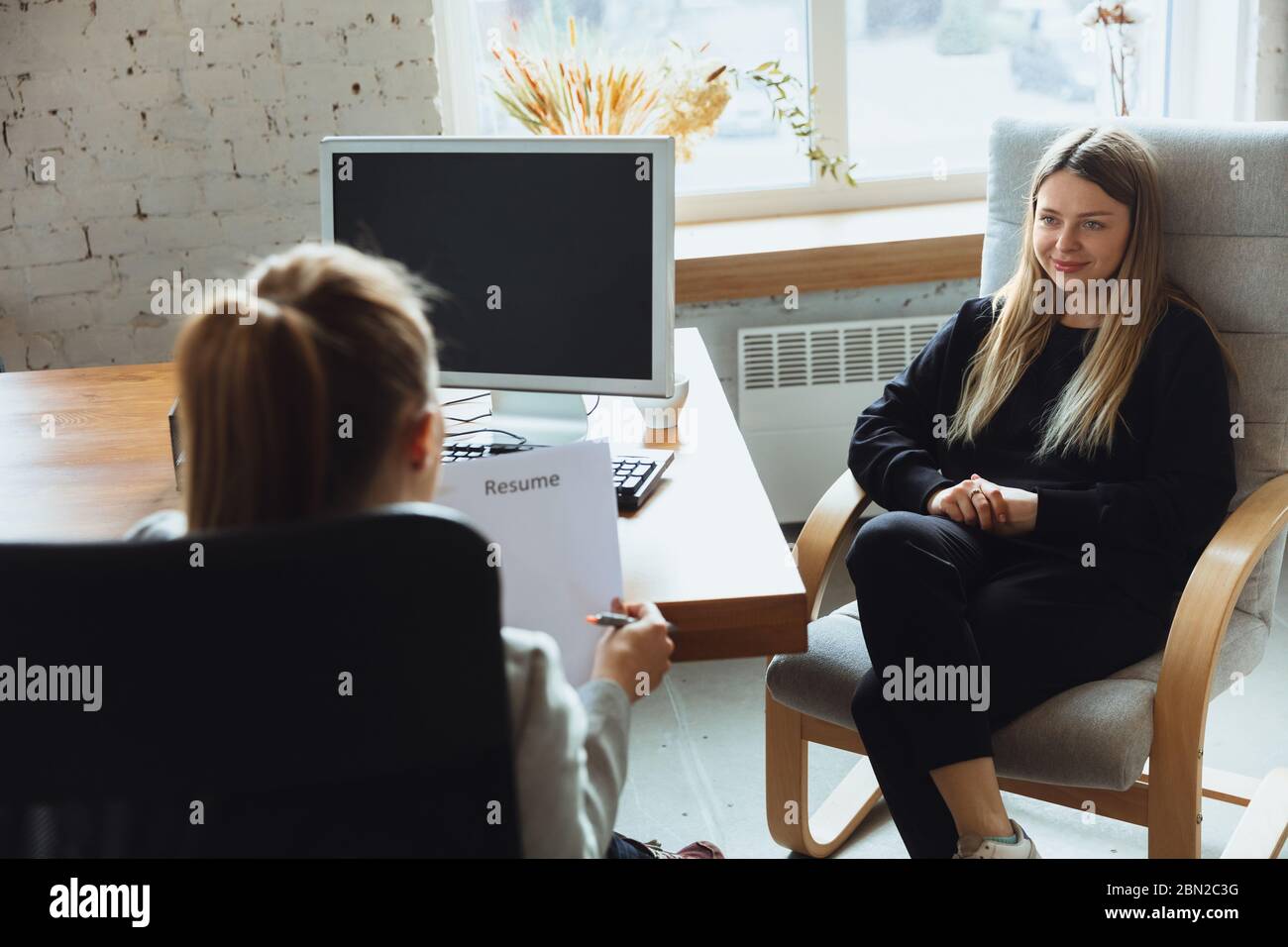 Woman interview smile work hi-res stock photography and images - Alamy