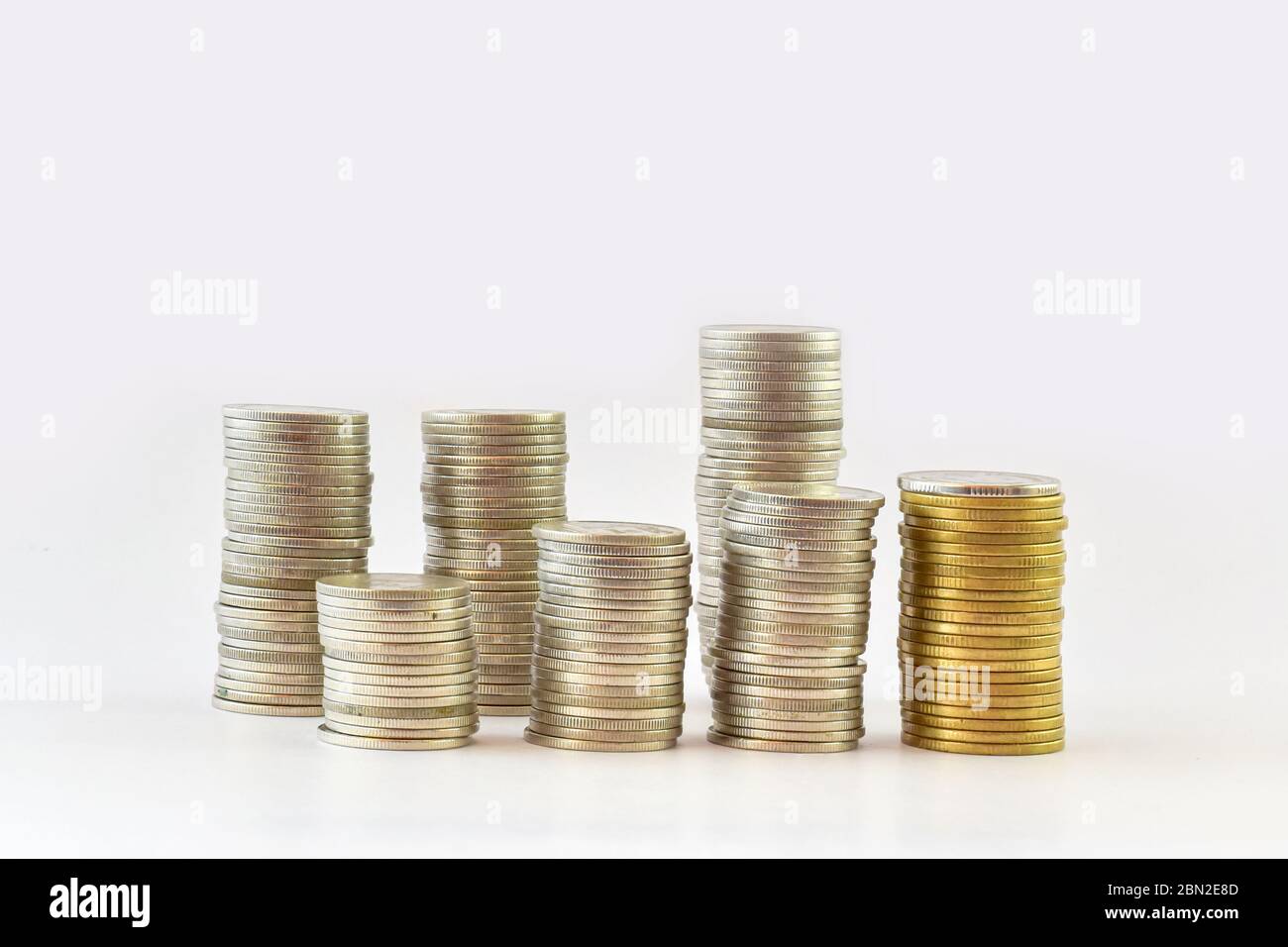 Coin stack isolated on white background. Investment growing business ...