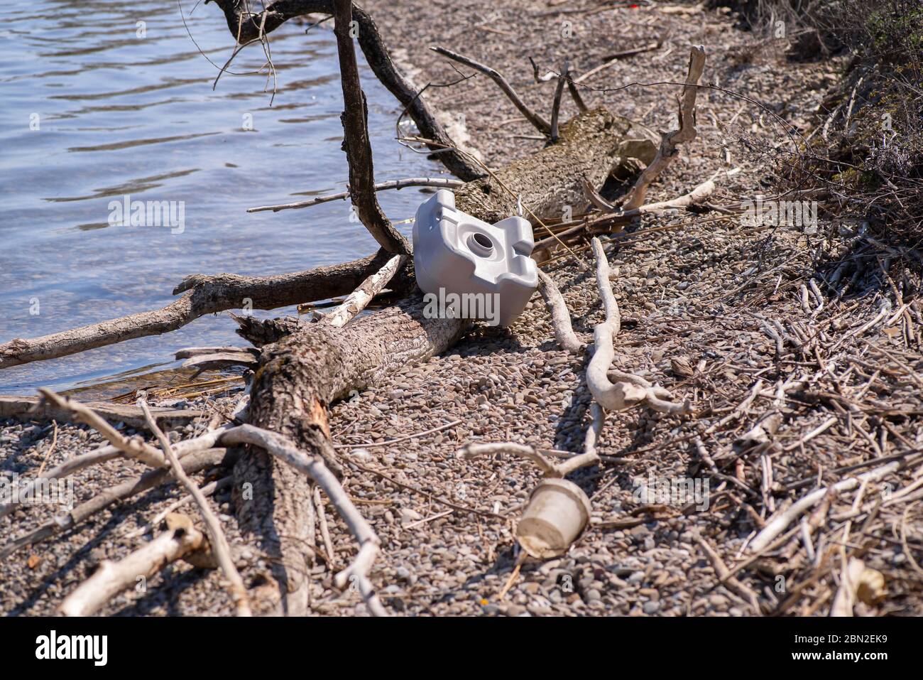 Environmental pollution.Garbage on the river, river pollution Stock ...