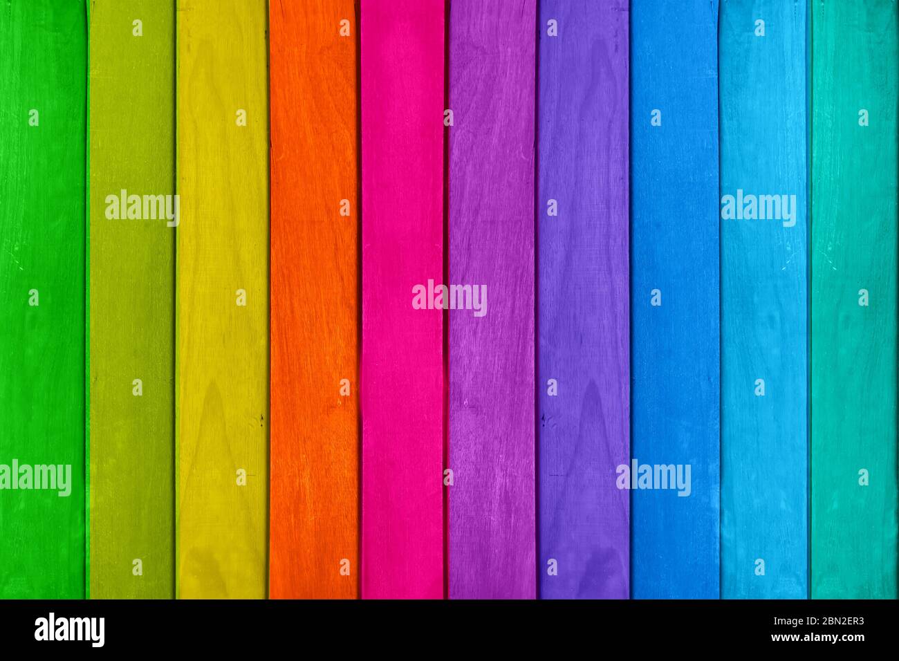 Rainbow colored wood texture background Stock Photo - Alamy