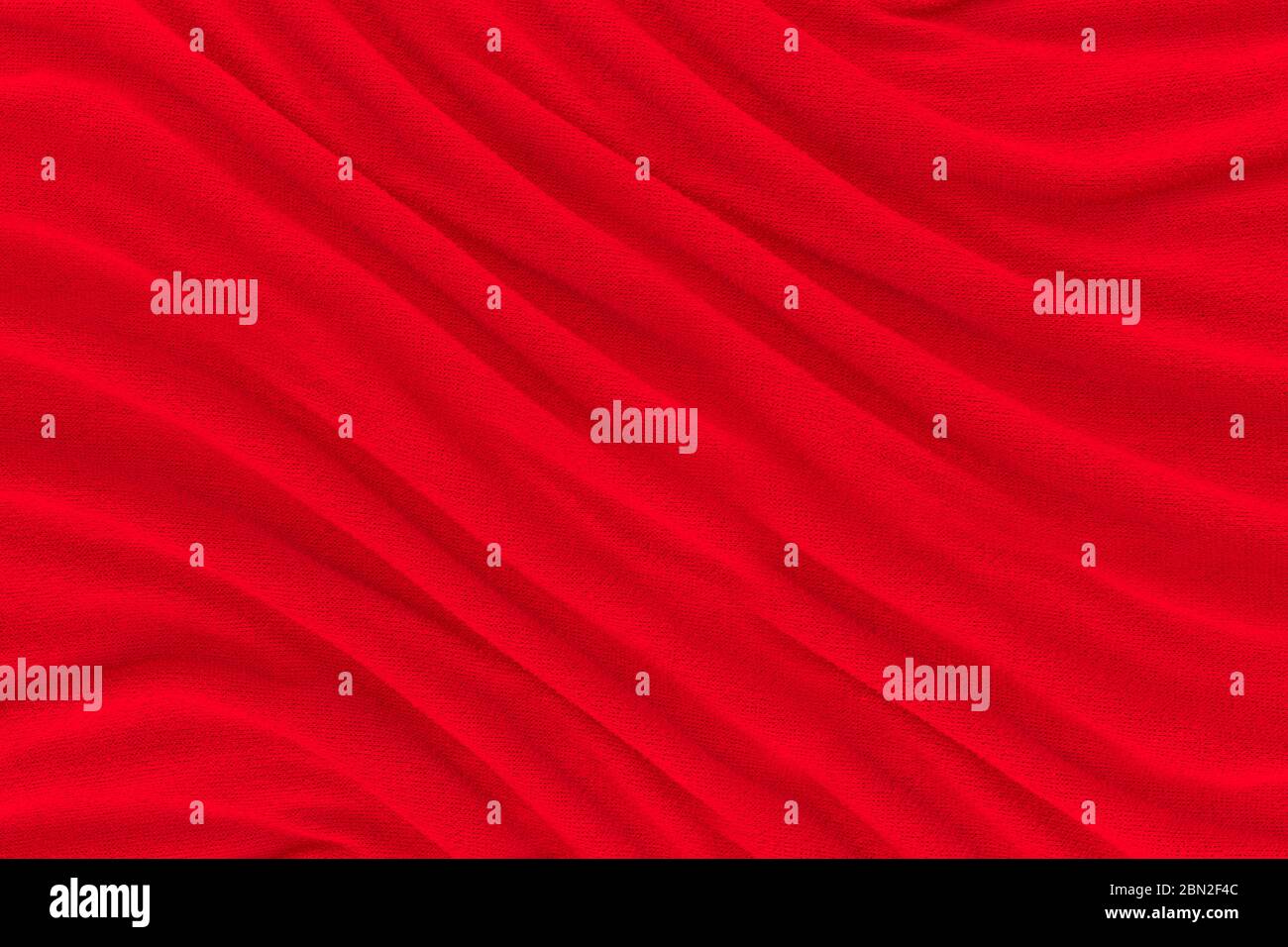 Red fabric texture background. Abstract cloth backdrop with soft waves ...