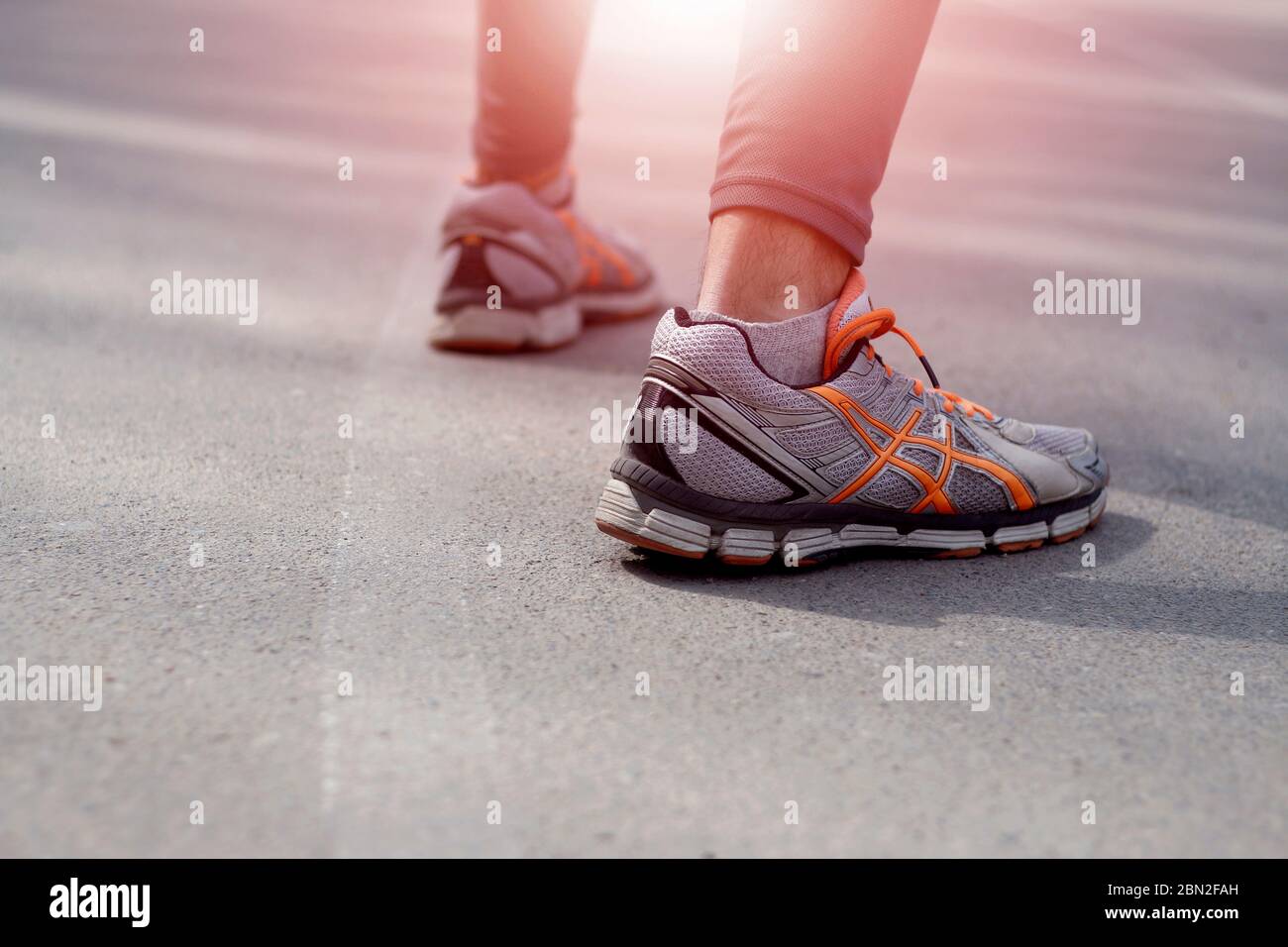 strong young man preparing for running in the park outdoor Stock Photo ...