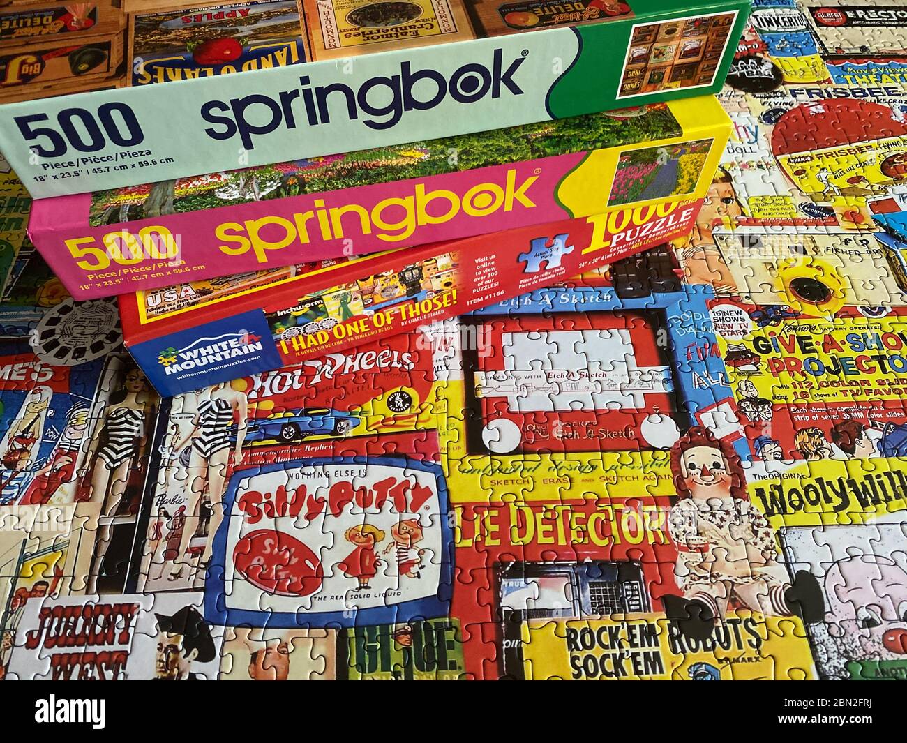 WOODBRIDGE, NEW JERSEY / USA - MAY 11, 2020: multiple jigsaw puzzles ...