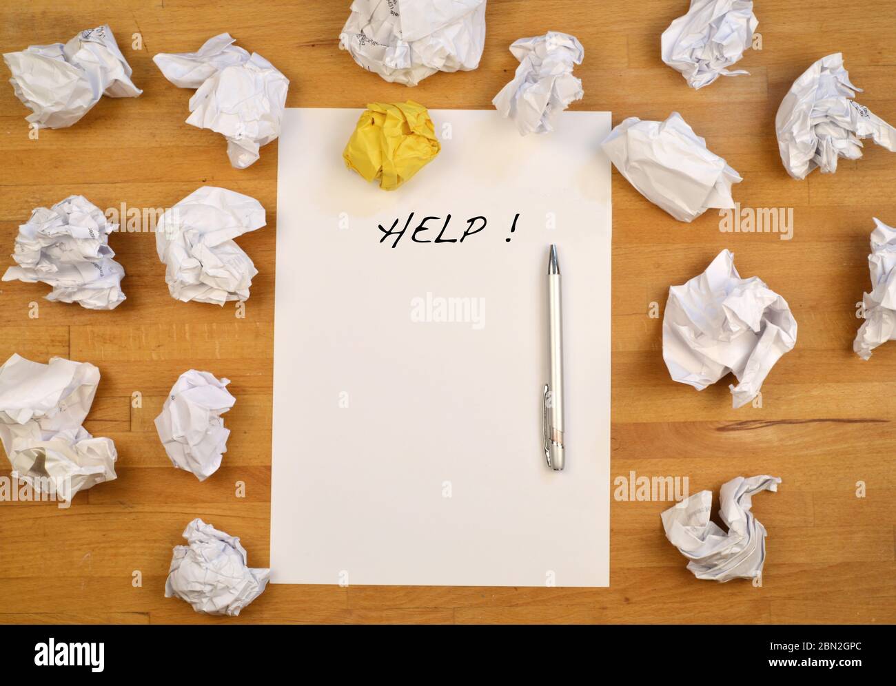 Papers and older Ideas on a working desk, help needed Stock Photo - Alamy