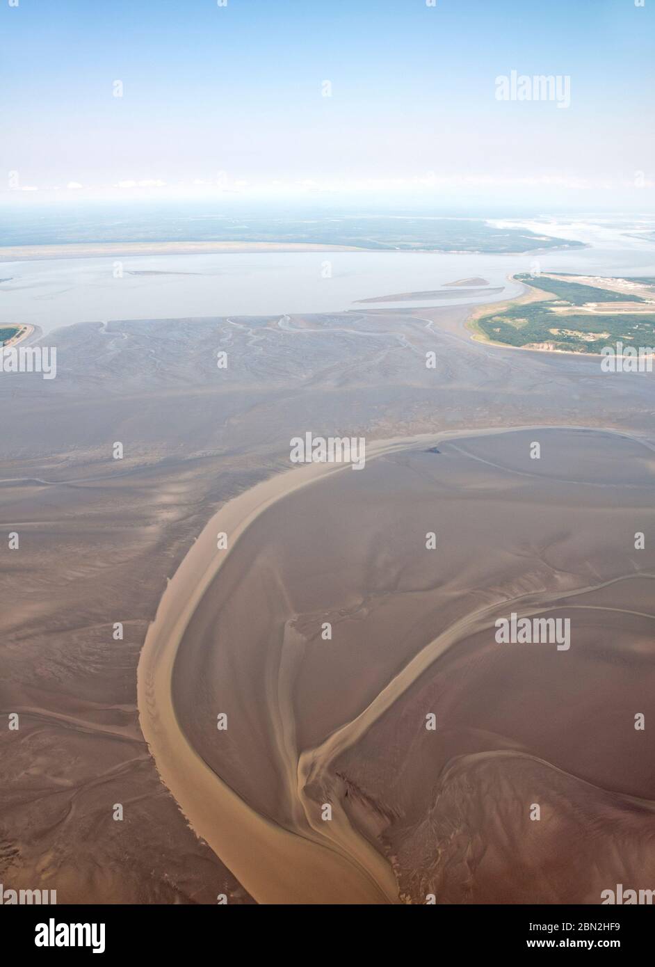 Wet flat mud flats hi-res stock photography and images - Alamy