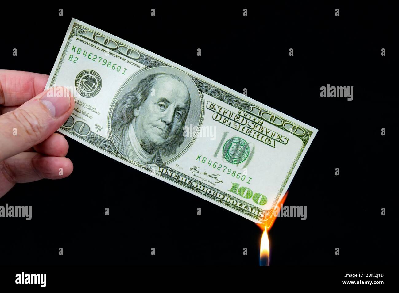 Burning dollar bill hi-res stock photography and images - Alamy