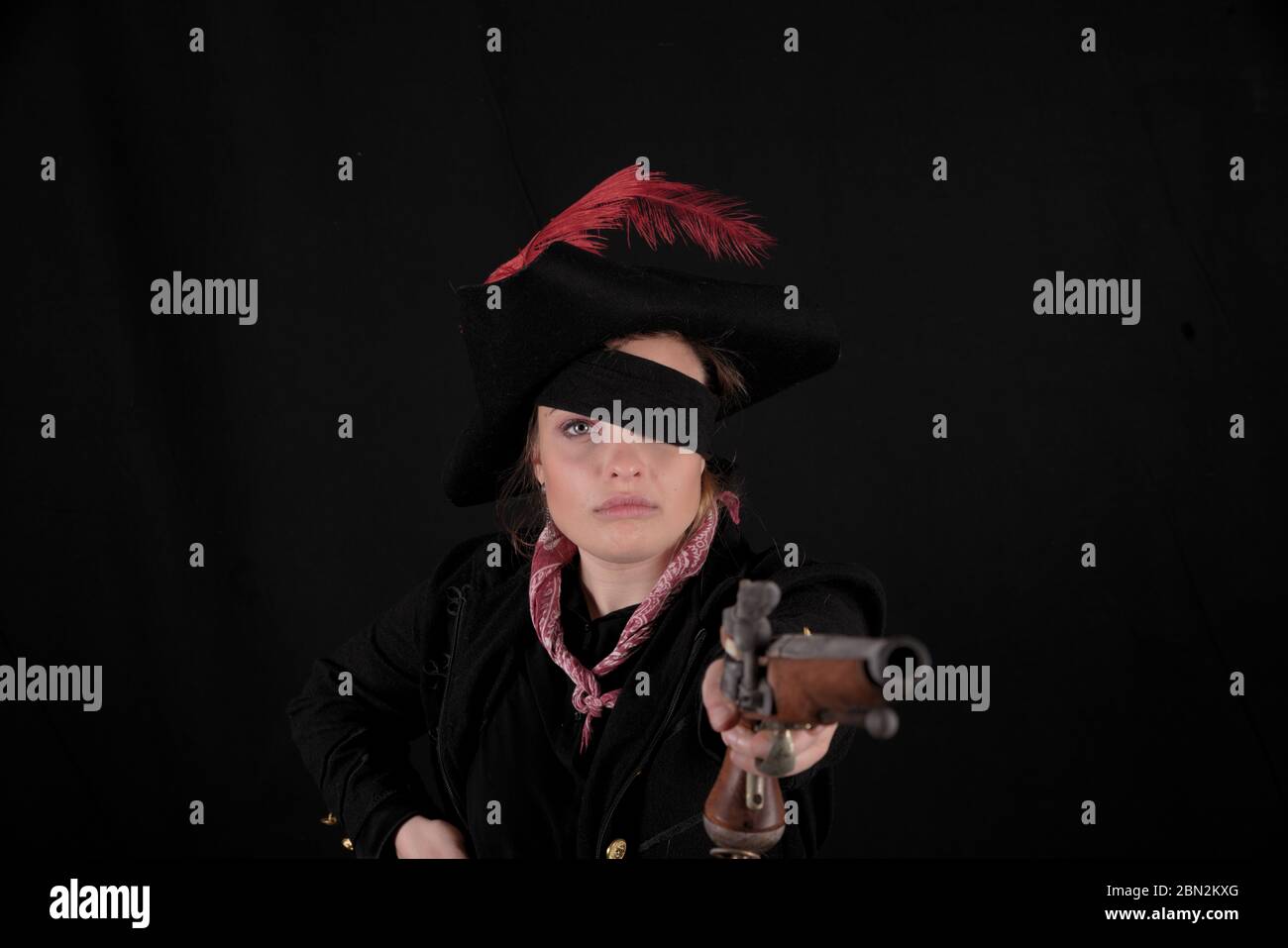 carribean girl pirate in the black background look the camera Stock ...