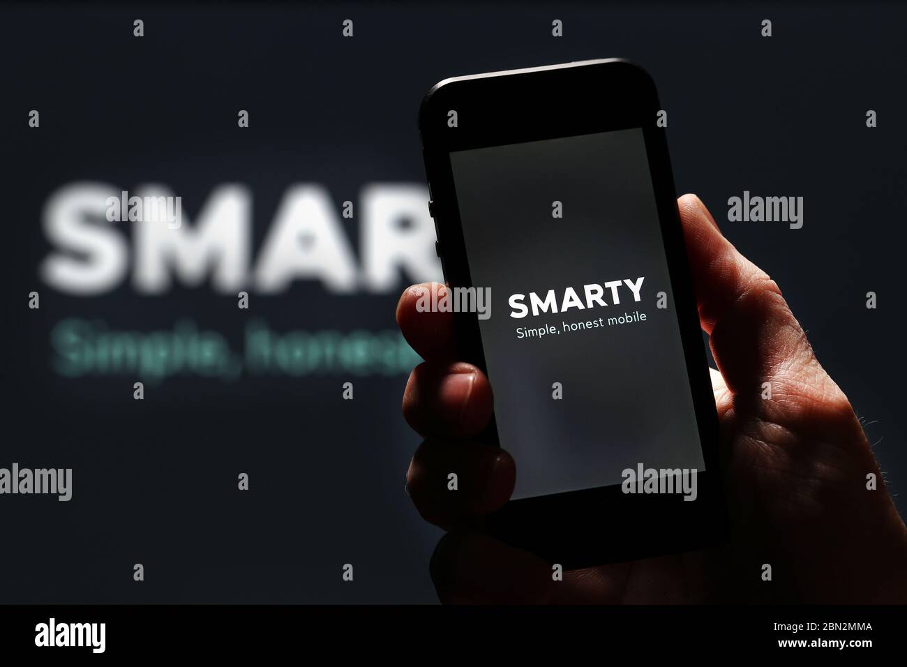 Smarty mobile phone network logo on a mobile phone (Editorial use only ...