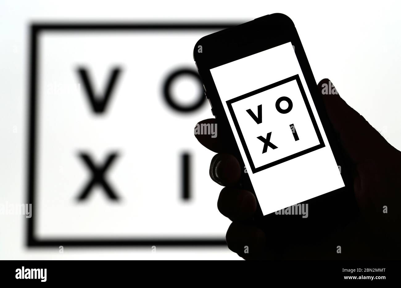 VOXI mobile phone network logo on a mobile phone (Editorial use only ...