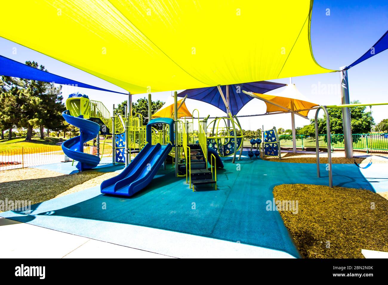Kids Playground Equipment Under Series Of Colorful Canopies Stock Photo ...