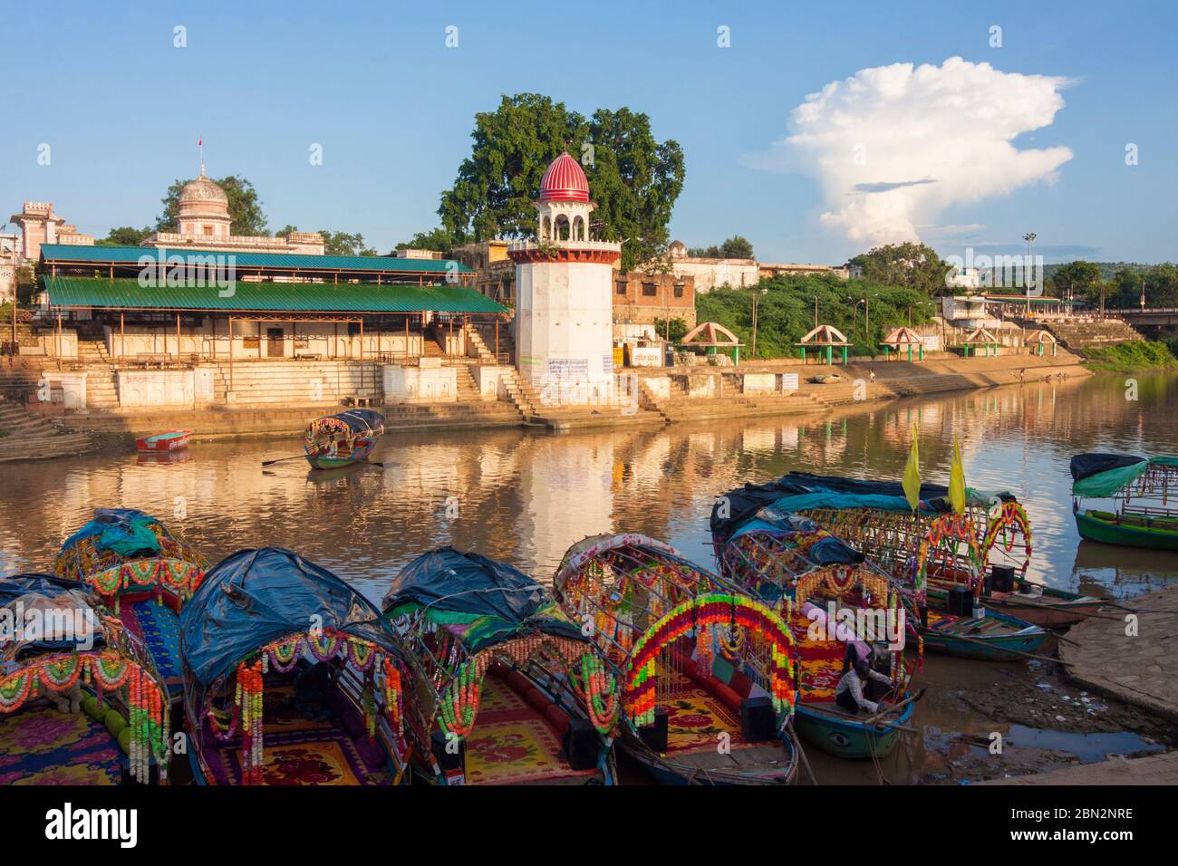 Chitrakoot, Madhya Pradesh, India : Colourful boats line near the steps ...