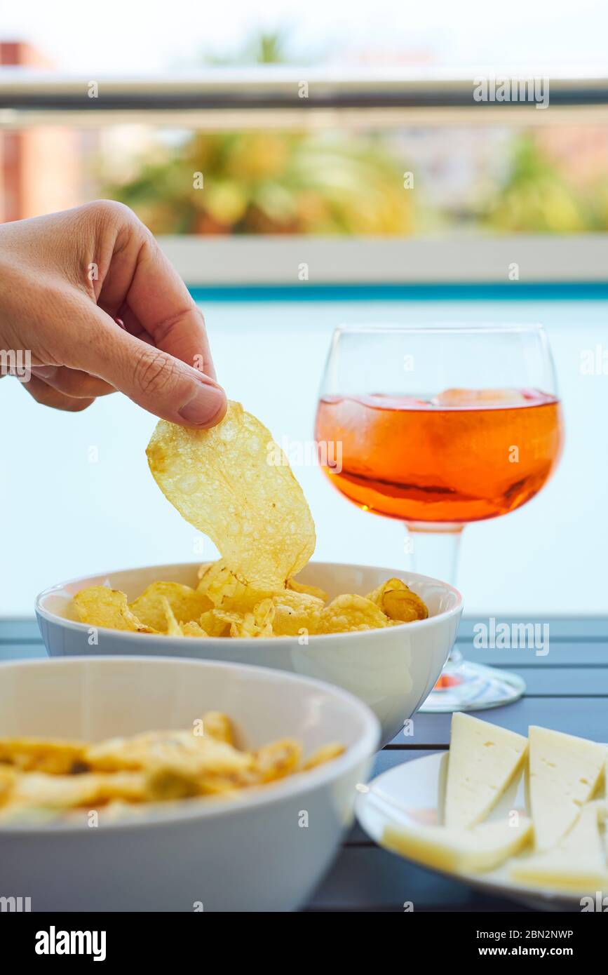 Man eating potato chips hi-res stock photography and images - Alamy
