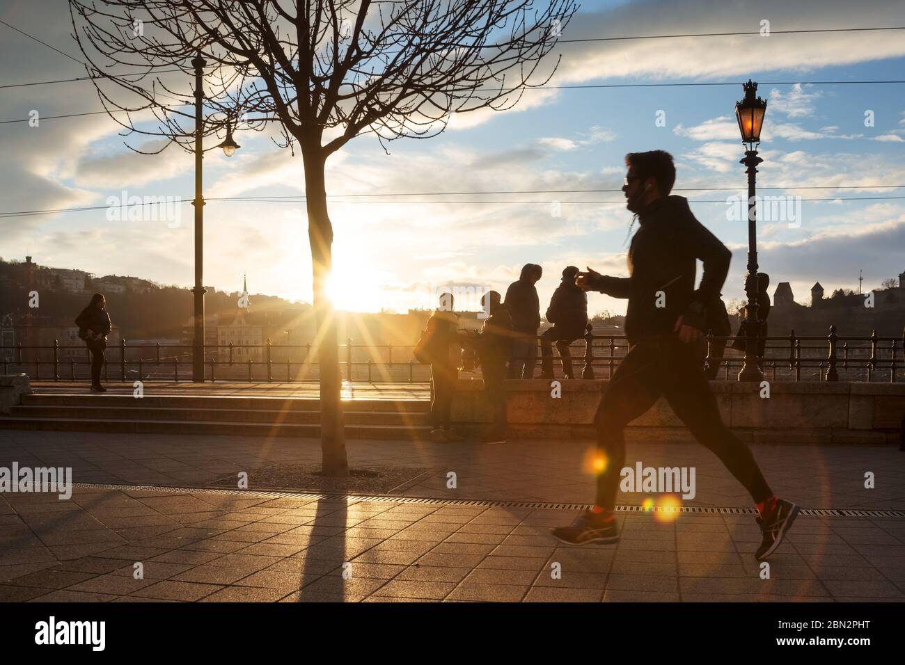 Silhouette man running in sun hi-res stock photography and images - Alamy
