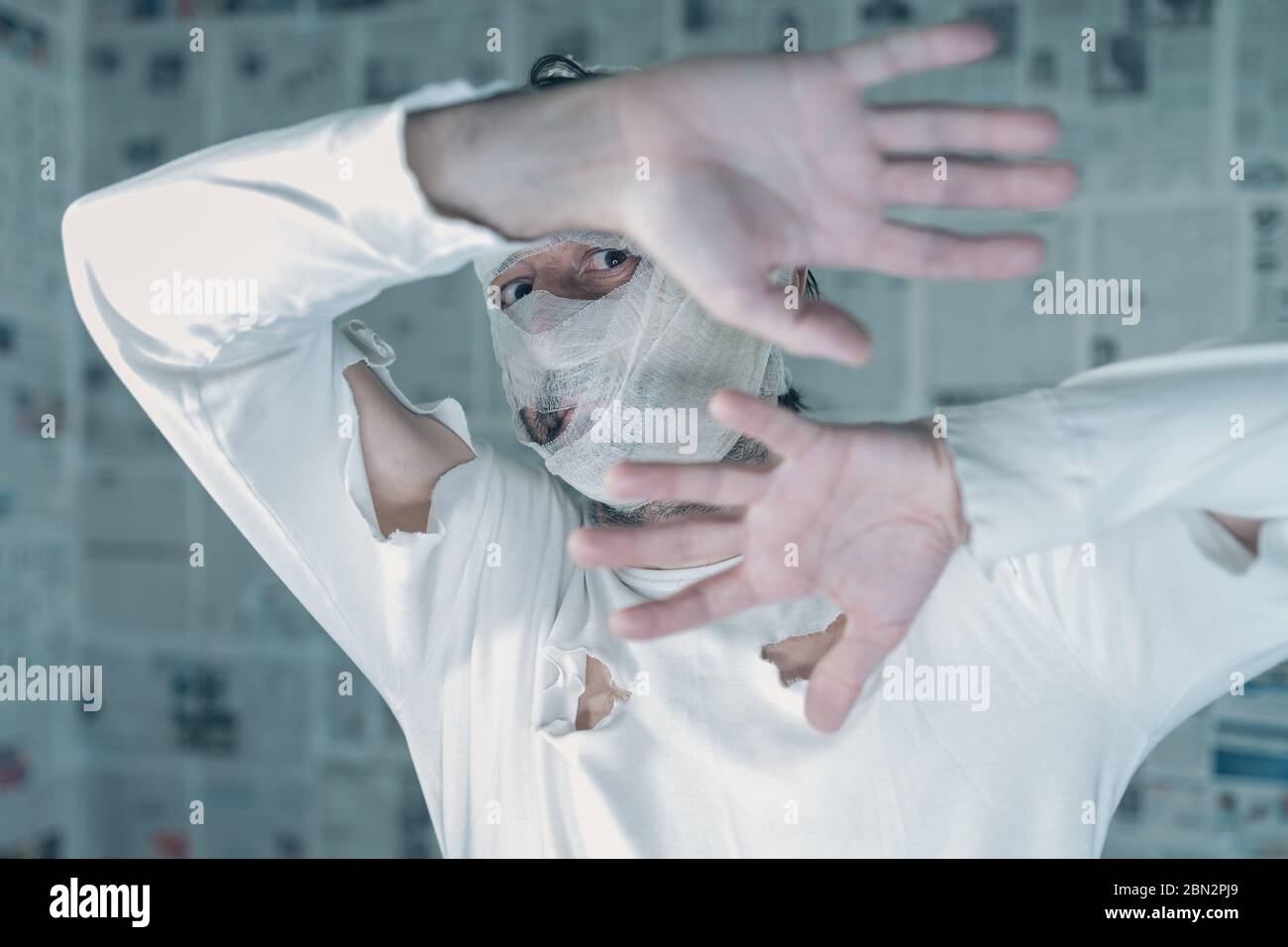 Victim of tabloid journalism and fake news infodemic, conceptual image ...