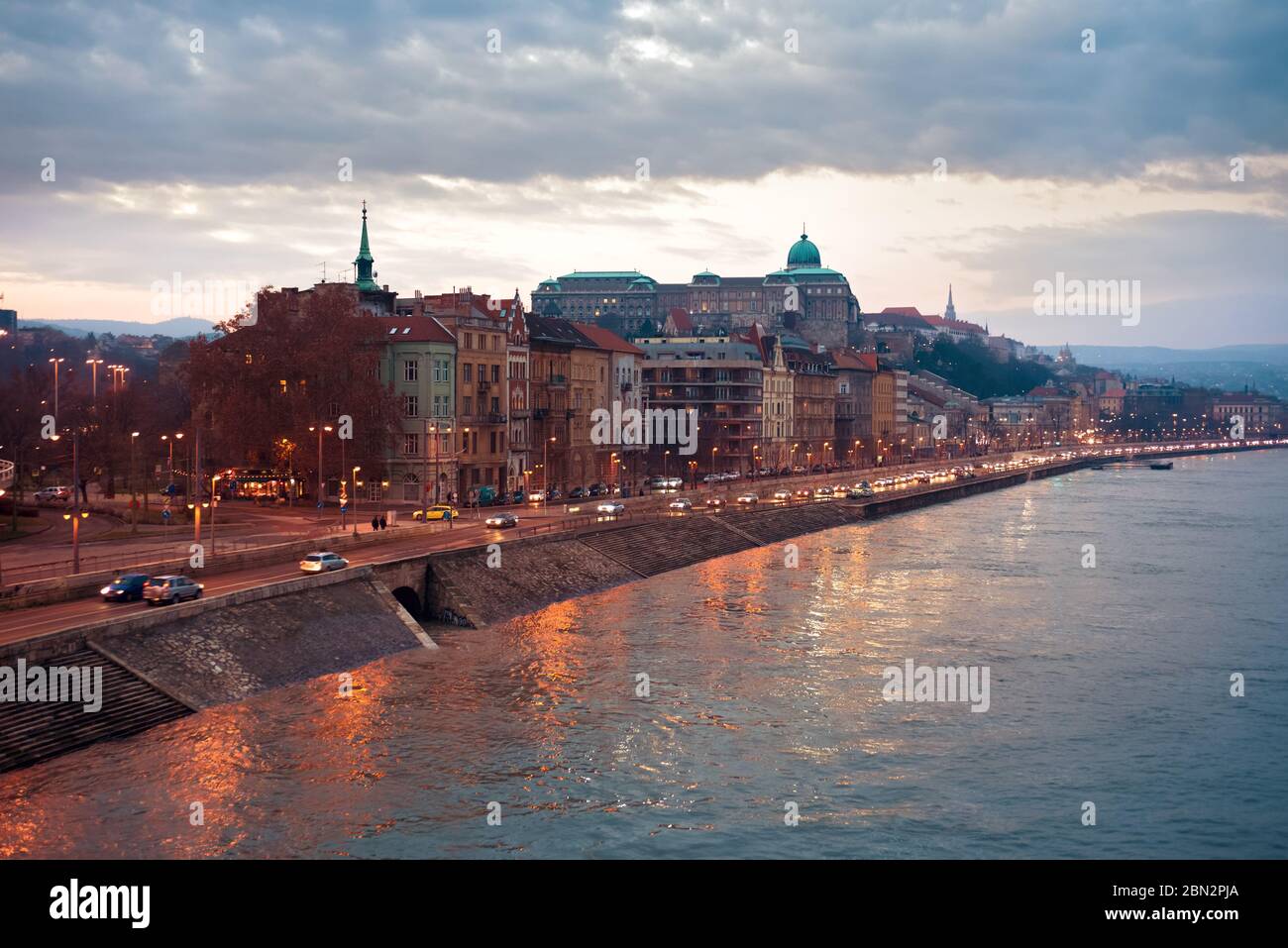 Budapest riverfront featuring Royal Palace of Buda at sunset Stock ...