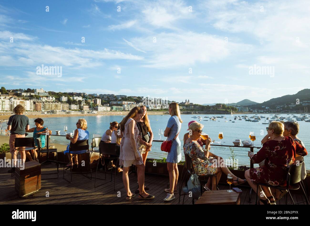 San Sebastian, Gipuzkoa, Basque Country, Spain : Women chill out in a ...
