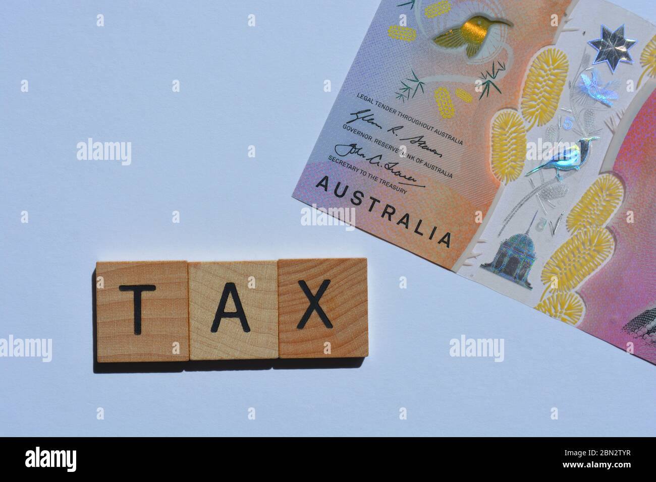 Australian banknote and the word Tax Stock Photo - Alamy