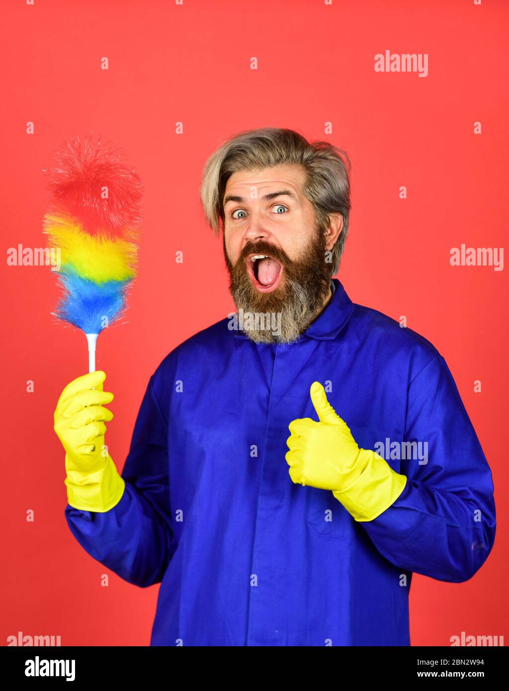 Gender inequality. man use pp duster. hipster holding the cleaning tool ...