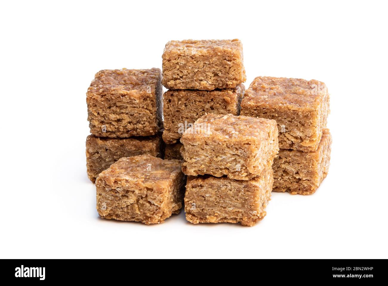 Mini oat and syrup flapjack slices isolated on white Stock Photo - Alamy