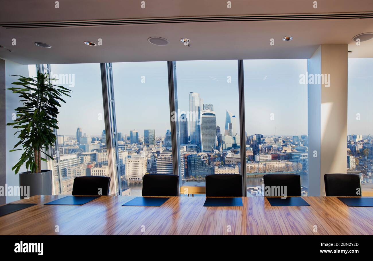 Scenic cityscape view from modern highrise conference room, London, UK ...